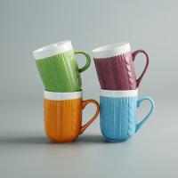 China 9oz two-tone cable knit design embossed ceramic coffee mug for sale