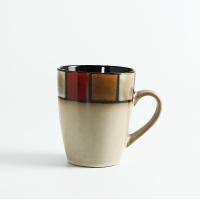 China Ceramic Coffee Cup With Round Shape And Grey Reactive Glaze Black Inside for sale