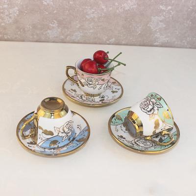 China Gold Plated Smiling Face Ceramic Coffee Cup and Saucer Set 5oz 4.2inch for sale