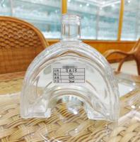 China Transparent 500ml 700ml 750ml XO Brandy Glass Bottles with Round Shape Collar for sale