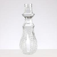 China Glass Small Wine Bottle with Embossed Engraved Mini Liquor Decanter Stopper Lid 50ml 100ml for sale