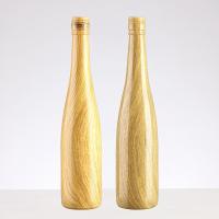 China Custom Size Accepted 750ml/350ml Wooden Pattern Glass Bottle for Beer Water Champagne for sale