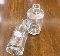 China 750ml Super Flint Jersey Glass Liquor Bottle with Cork Eco-friendly and Customizable for sale