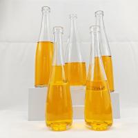 China Customized Shape Mineral Packaging Glass Bottles with Cork Supply Bulk Sale 330ml 520ml for sale