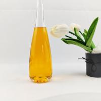 China Customized Shape Mineral Packaging Glass Bottles with Cork Supply Bulk Sale 330ml 520ml for sale