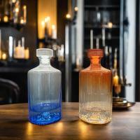 China Glass Bottle for Whiskey Vodka Gin 500ml Capacity Mountain Design Spray Cap Included for sale