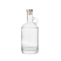 China Sturdy Base 750ml Glass Vodka Whiskey Bottle with Handle and Customization Service for sale