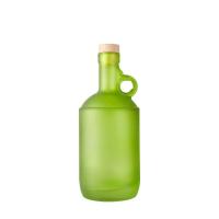 China Sturdy Base 750ml Glass Vodka Whiskey Bottle with Handle and Customization Service for sale