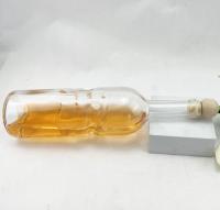 China 750ml Angel Hand Red Wine Glass Bottle with Cork Elegant and Functional Design for sale