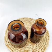China Clear Glass Collar 100ml 150ml Empty Luxury Round Amber Reed Diffuser Bottle for Liquor for sale