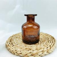 China Clear Glass Collar 100ml 150ml Empty Luxury Round Amber Reed Diffuser Bottle for Liquor for sale