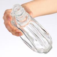 China Glass Round Shape 700ml 750ml Clear Empty Flint Liquor Wine Vodka Tequila Bottle for sale