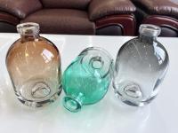 China 250ml 375ml 500ml Thick Bottom Glass Whiskey Bottle with Customized Clear Round Design for sale
