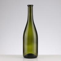 China Empty 750ml Olive Green Round Glass Wine Bottle with Cork Hot Stamping Surface Handling for sale