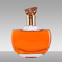 China Customized Logo Clear Oblate Shape Glass Bottle For 500ml 750ml Whisky Brandy Liquor for sale