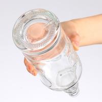 China 550ml/700ml/750ml Wine Red Wine Spirits Glass Bottle with Screw Cap Big Belly Design for sale