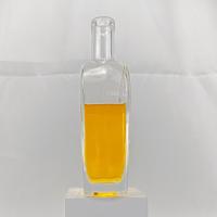 China Eco-friendly Glass Body 750ml Glass Wine Bottle with Lid in Unique Design Shape for sale