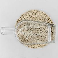 China Eco-friendly Glass Body 750ml Glass Wine Bottle with Lid in Unique Design Shape for sale