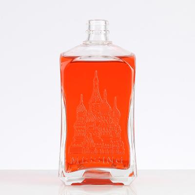 China Clear Glass Collar 750ml Embossed Bottle for Alcoholic Beverages and Drinks for sale