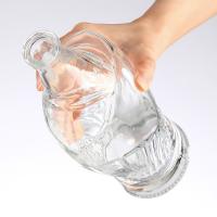 China Custom Design Round Shape 750ml Glass Whisky Bottle with Cork and Clear for sale