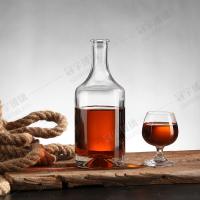 China Acid Etch Surface Round Shape 750ML RUM WHISKEY Glass Bottles for Alcohol Packaging for sale
