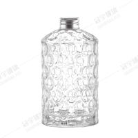 China Custom Logo Acceptable Concave And Convex Glass Bottle at Direct Chinese for Decorative for sale