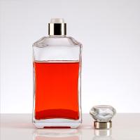 China Free Sealing Square Shape Glass Bottle with Luxury Marble Ball Cap and Crown Cap Sealing for sale