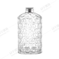 China Custom Logo Acceptable Concave And Convex Glass Bottle at Direct Chinese for Decorative for sale