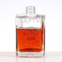 China Colors Request 700ML Super Flint Square Glass Vodka Bottle with Cork in Round Shape for sale