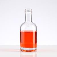 China 50ml 100ml 250ml Glass Spirit Bottles with Screw Cap Hot Stamping Surface Handling for sale