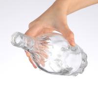 China Glass Water Bottle for Voss Round Shoulder Slender Wine Bottle Body Material Glass for sale