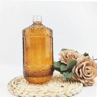 China 750ml Brown Glass Wine Bottle with Textured Surface Body Material Glass Clear Empty for sale