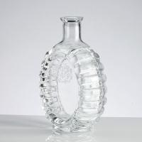 China Hot Stamping 500ML Ultra Clear Brandy Glass Bottle With Embossed Logo for sale