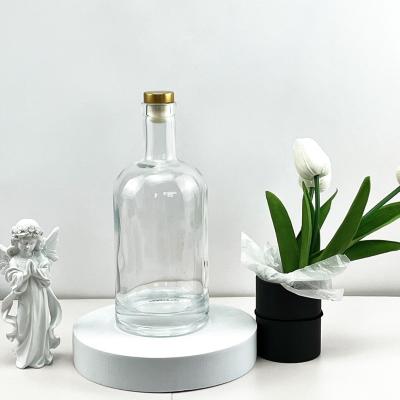 China Glass Beverage Bottle 700ml 750ml 1L Nordic Empty Rum Whisky Vodka Spirit With Cork for sale