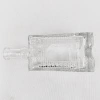 China 680ml Square Glass Vodka Bottle with Engraved Design Customized Spirit Bottle for sale