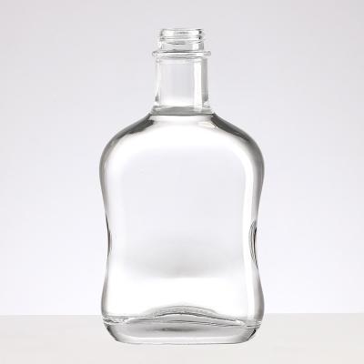 China Beverage Industrial 50ml Mini Glass Bottle with Metal Screw Cap and Customized Logo for sale
