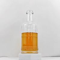 China Custom Glass Bottle for Vodka Spirits High Polymer Plug Transparent Cylindrical Shape for sale
