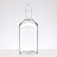 China Customized 550ml 750ml Glass Wine Bottle with Metal Screw Cap and Customized Logo for sale