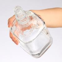 China Customized 550ml 750ml Glass Wine Bottle with Metal Screw Cap and Customized Logo for sale