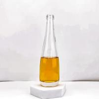 China Easy Open End Sealing Type 500ml Cone Glass Bottles for Luxury Wine and Round Shape for sale