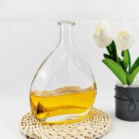 China Glass Products Made in Spiral Whiskey Vodka Rum Tequila Gin Spirits Bottle with Lid for sale
