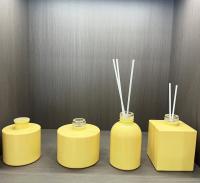 China Body Material Glass Aromatherapy Bottles for Spot Round Colored Empty Reed Bottles for sale