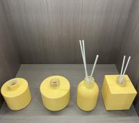 China Body Material Glass Aromatherapy Bottles for Spot Round Colored Empty Reed Bottles for sale