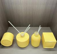 China Body Material Glass Aromatherapy Bottles for Spot Round Colored Empty Reed Bottles for sale