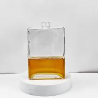 China 200ml Transparent Whiskey Glass Bottle with Lid The Newest Flat Bottom Square Design for sale