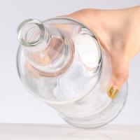 China 750ml Vodka Glass Bottle with Lid Finish and Customized Logo in Flint Glass for sale