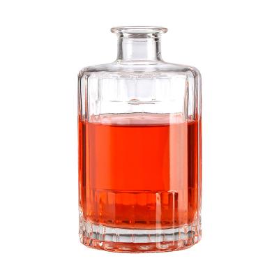 China Hot Stamping Surface Handling Custom Logo Empty Glass Bottle for Liquor Rum Gin Tequila for sale