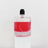 China Glass Body Material 100ml Unique Empty Perfume Bottle with Sprayer and Cork Cap for sale