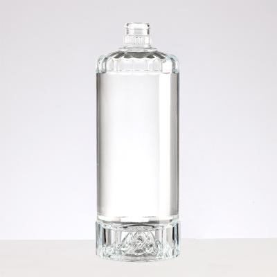 China Customized Logo Clear Glass Round Wine Bottle with Short Neck and Thin Mouth Beverage for sale
