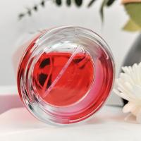 China Empty Silver Cap Round Glass Perfume Bottle with Thick Bottom and Clear Material for sale